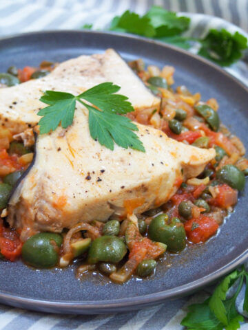 Sicilian swordfish with olives and capers (pesce spada alla ghiotta ...