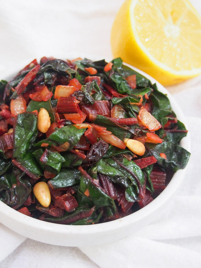 Sauteed Swiss chard with raisins & pine nuts - Caroline's Cooking